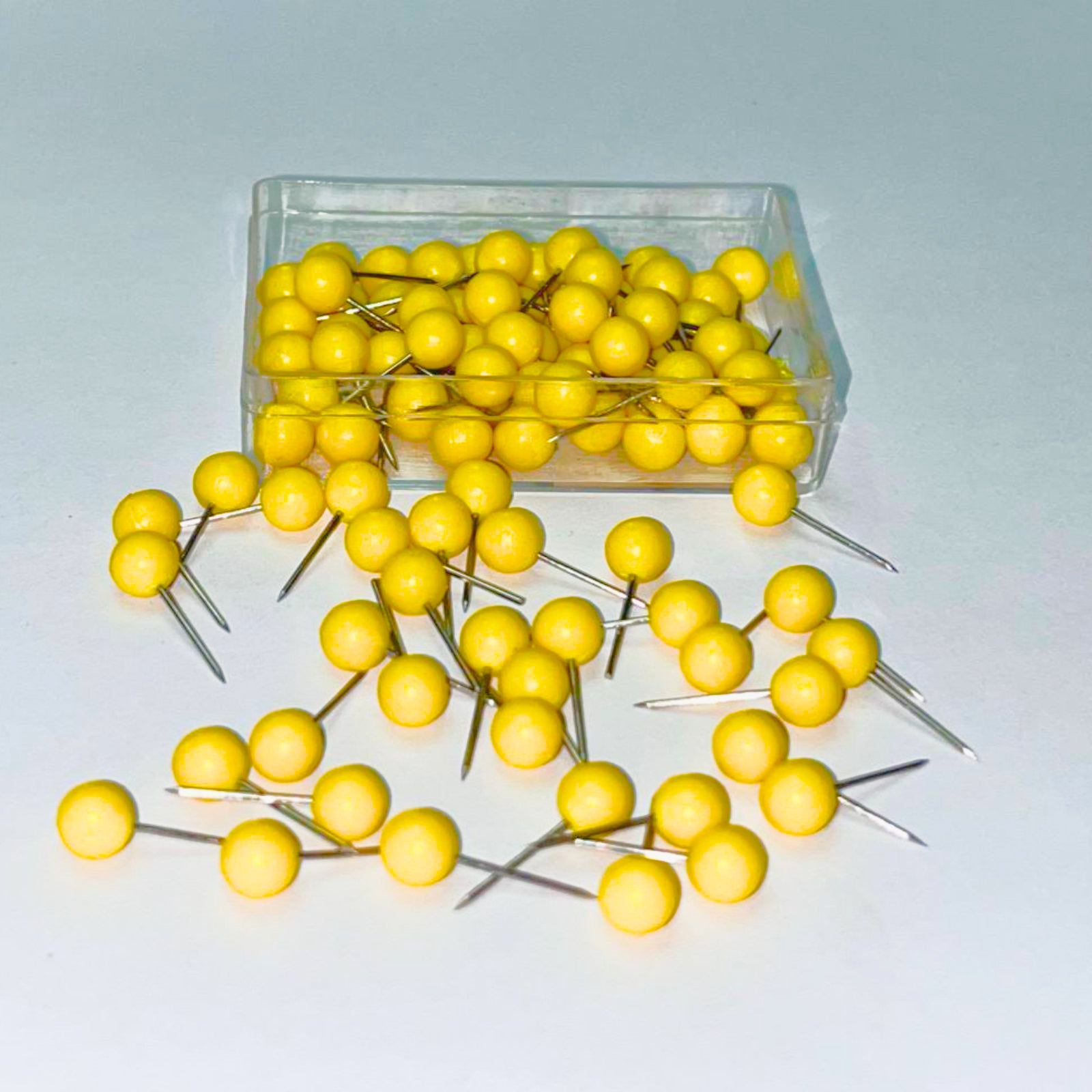 Yellow Push Pins to mark travels