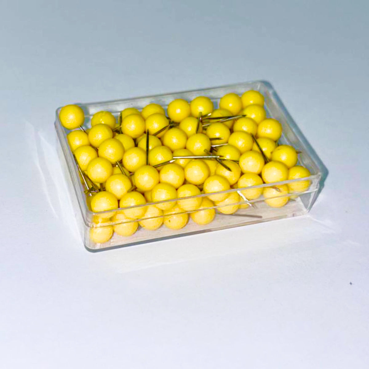 Yellow Push Pins to mark travels